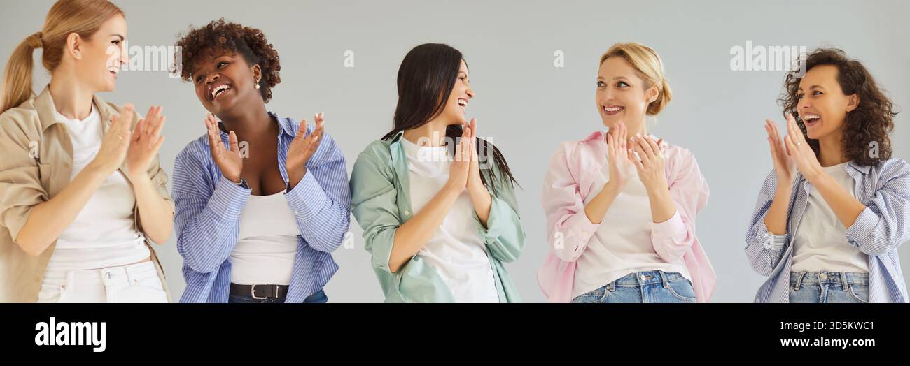 Glad young woman clapping hands hi-res stock photography and images - Alamy