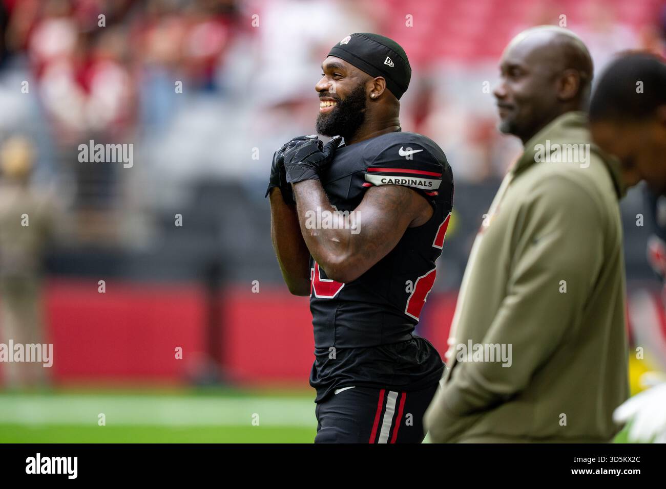 Arizona Cardinals running back Bam Knight smiles with is helmet off ...