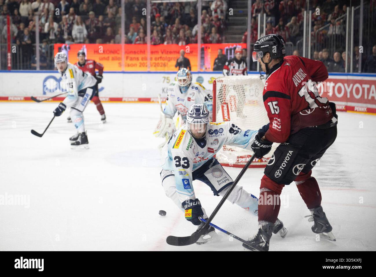 Davod Suvanto (Dresden Eislöwen, Defense, #33); Louis- Marc Aubry ...