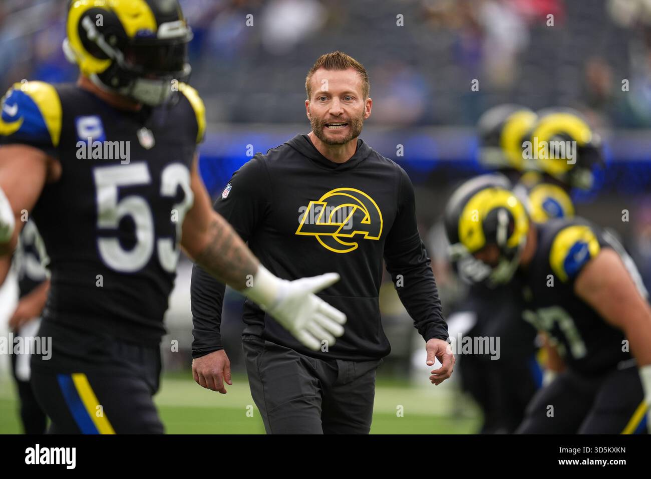Los Angeles Rams head coach Sean McVay watches his team warm up prior ...