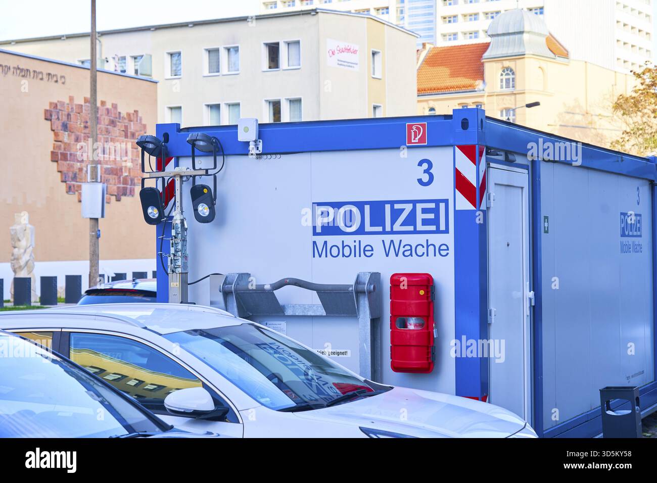 Mobile police station in front of new synagogue and synagogue community ...