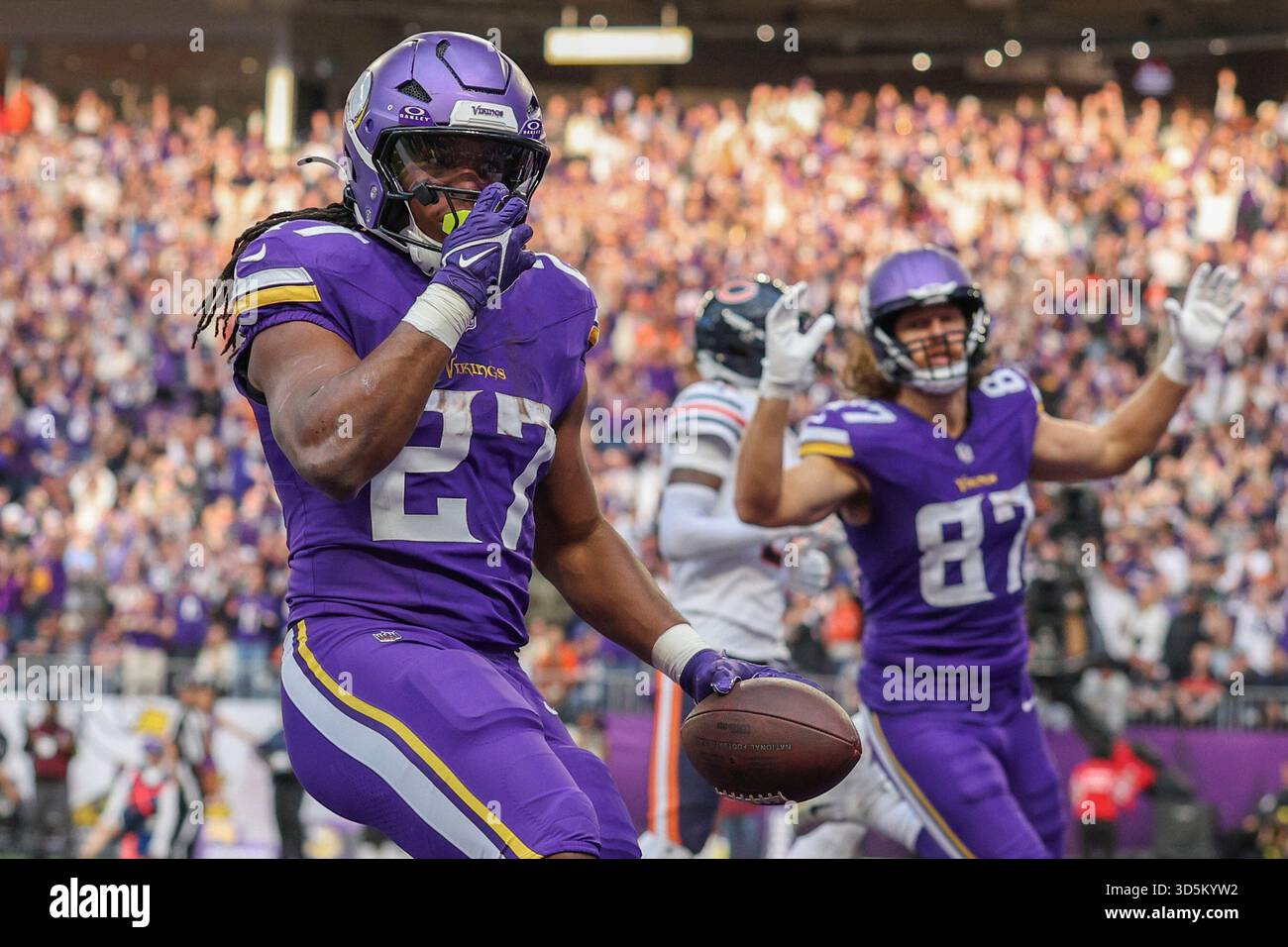 Minnesota Vikings running back Jordan Mason (27) runs in a touchdown ...