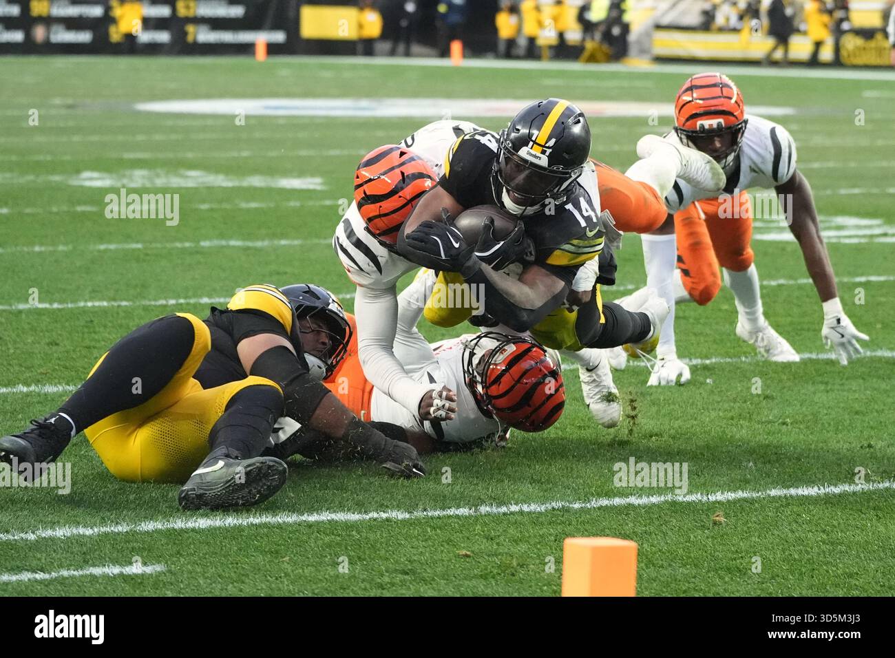 Cincinnati Bengals defensive end Joseph Ossai (58) tackles Pittsburgh ...