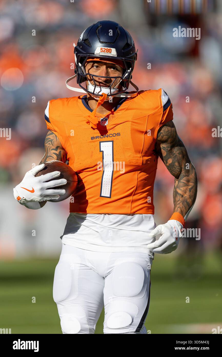 Denver Broncos tight end Evan Engram (1) warms up before playing ...