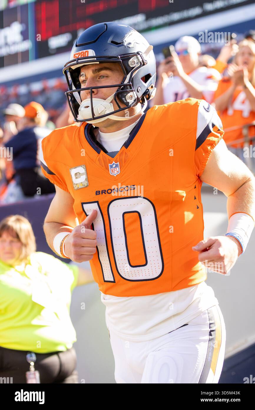 Denver Broncos quarterback Bo Nix (10) enters the field to warm up ...