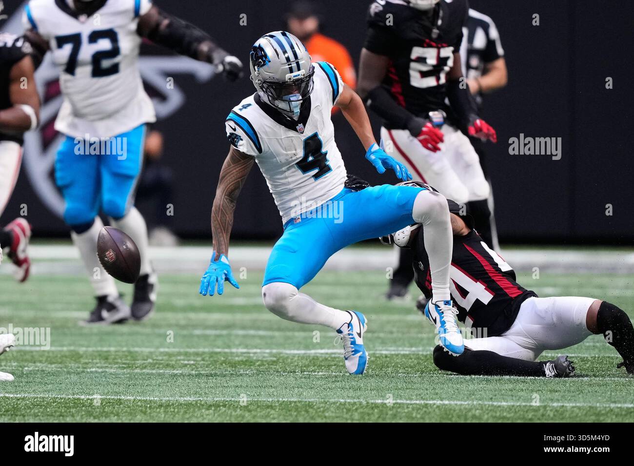 Carolina Panthers wide receiver Tetairoa McMillan (4) drops a pass in ...