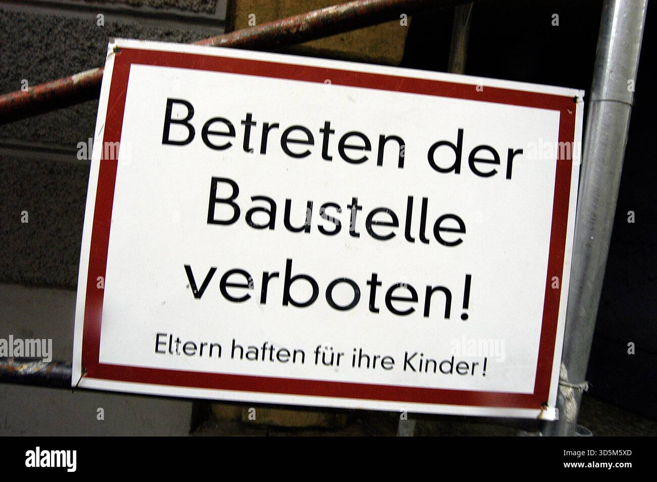 an attention construction site sign, trespass forbidden for non ...