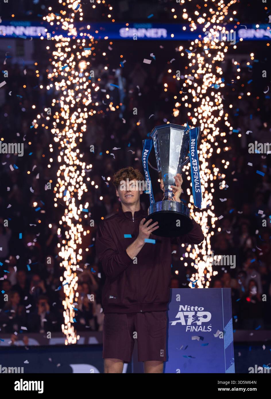 Jannik Sinner from Italy celebrates with the trophy after victory in ...