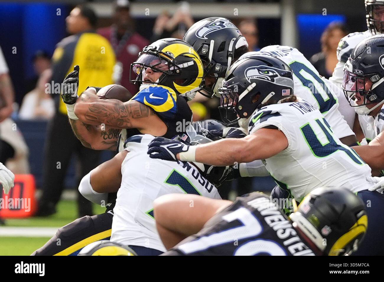 Los Angeles Rams running back Blake Corum is stopped short of a ...