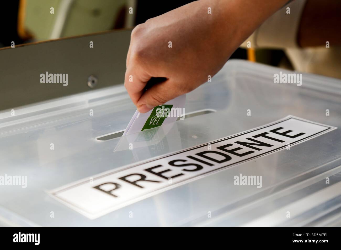A person casts their vote during the 2025 Chilean presidential elections in Santiago, Chile on ...