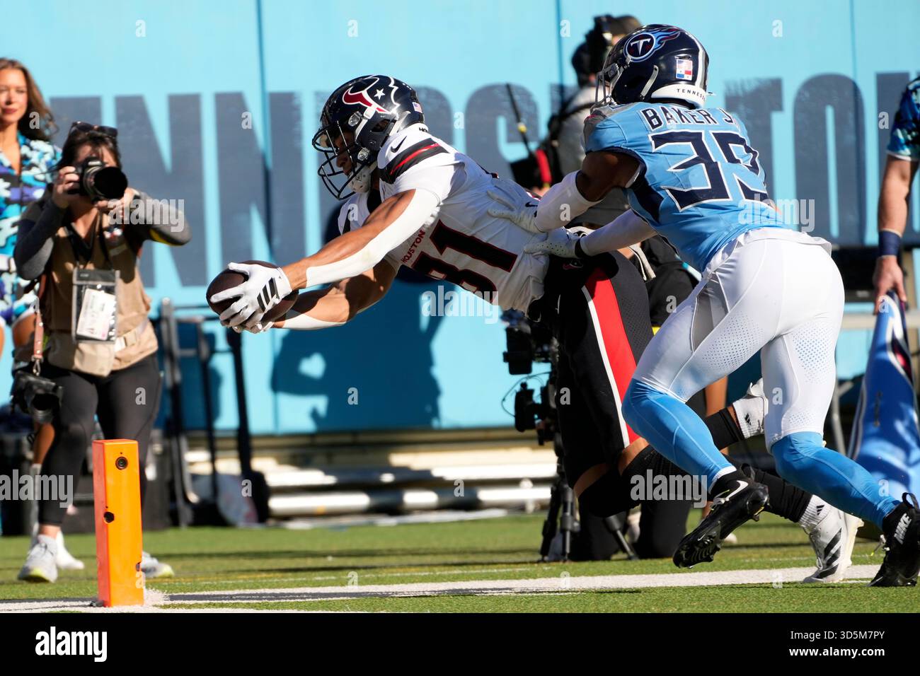 Houston Texans wide receiver Jayden Higgins (81) is pushed out of ...