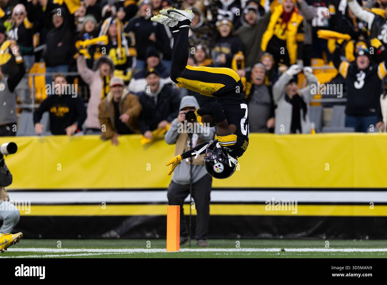 Pittsburgh Steelers cornerback James Pierre (42) front flips into the end zone for a touchdown ...