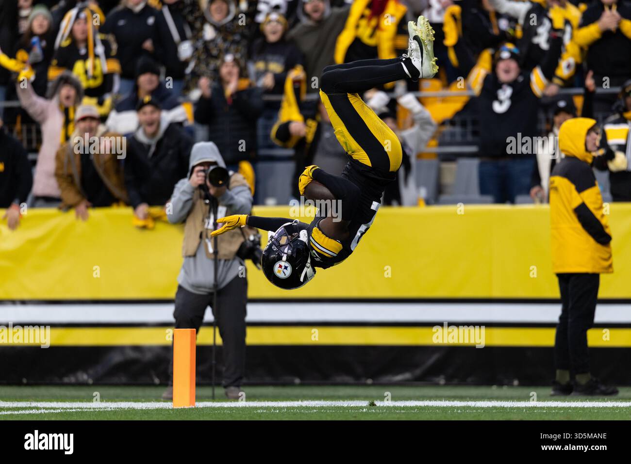 Pittsburgh Steelers cornerback James Pierre (42) front flips into the ...