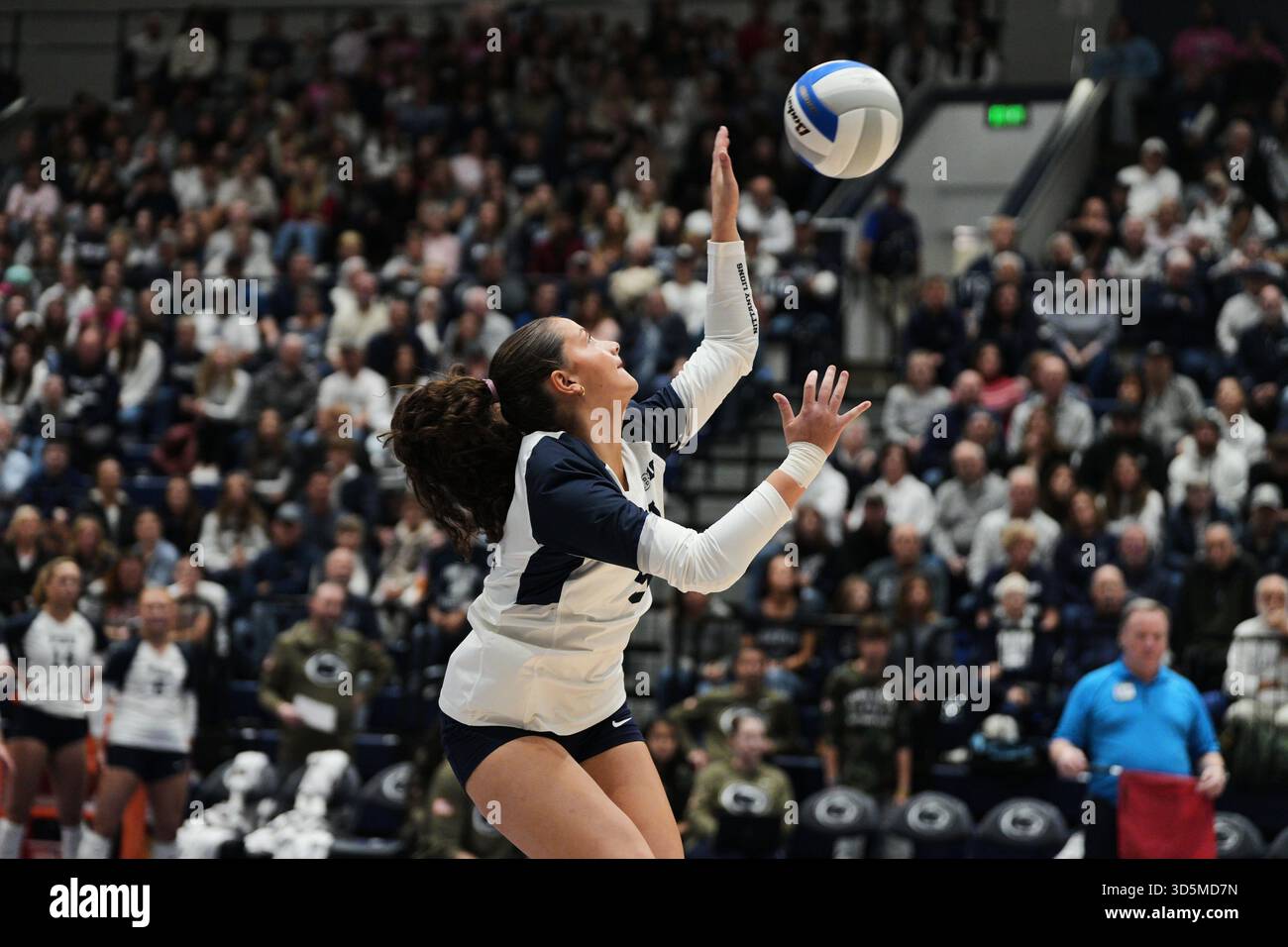 Penn State defensive specialist Lexi Gin serves during an NCAA college ...