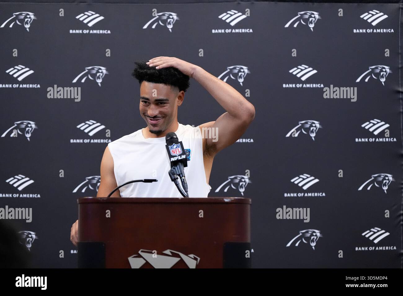 Carolina Panthers quarterback Bryce Young talks to reporters after an ...