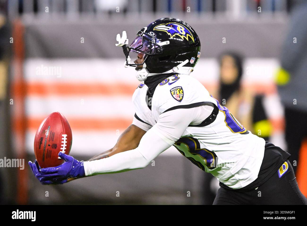 Baltimore Ravens quarterback Lamar Jackson (8) fumbles a punt in the ...