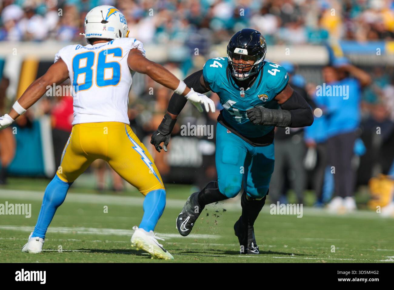 Jacksonville Jaguars defensive end Travon Walker (44) rushes during an ...