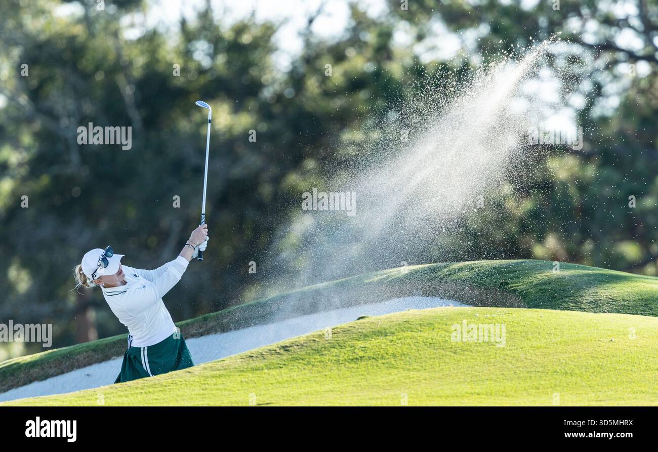 Nataliya Guseva hits out of the sand trap on the 17th fairway during ...