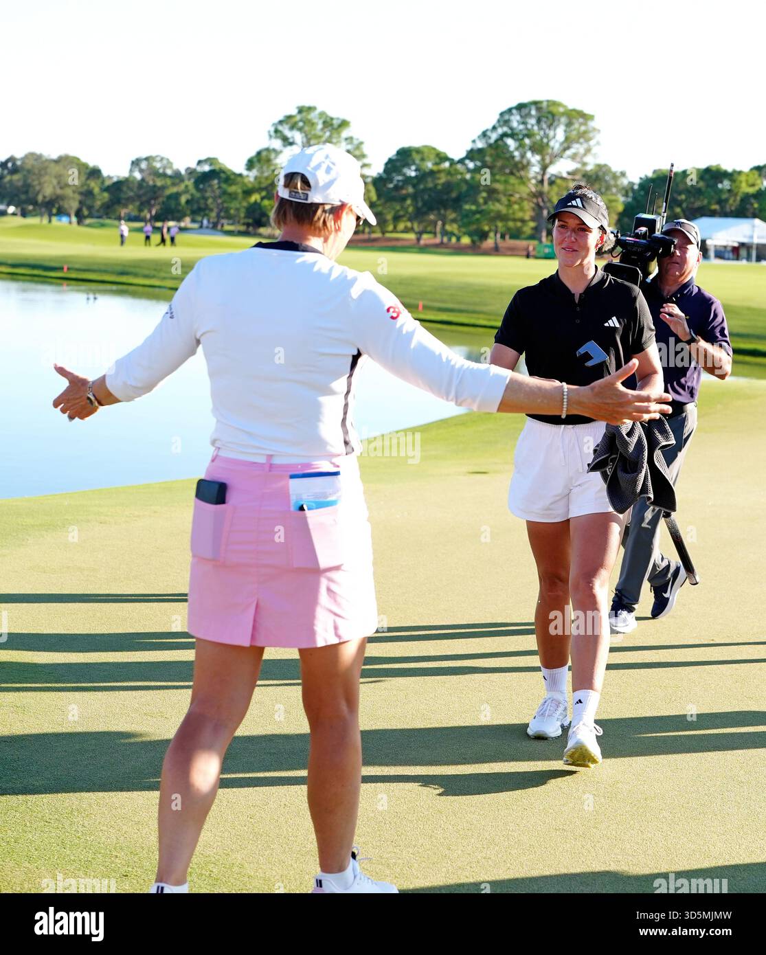 BELLEAIR, FL - NOVEMBER 16: LPGA golfer Linn Grant gets a hug from ...