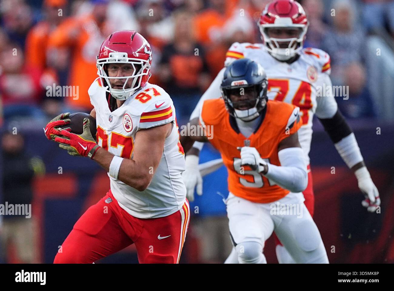 Kansas City Chiefs tight end Travis Kelce runs with the ball after ...