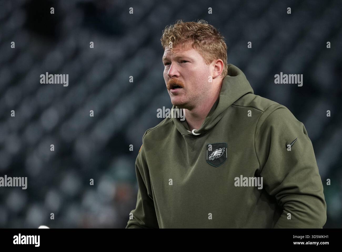 Philadelphia Eagles center Cam Jurgens warms up before an NFL football ...