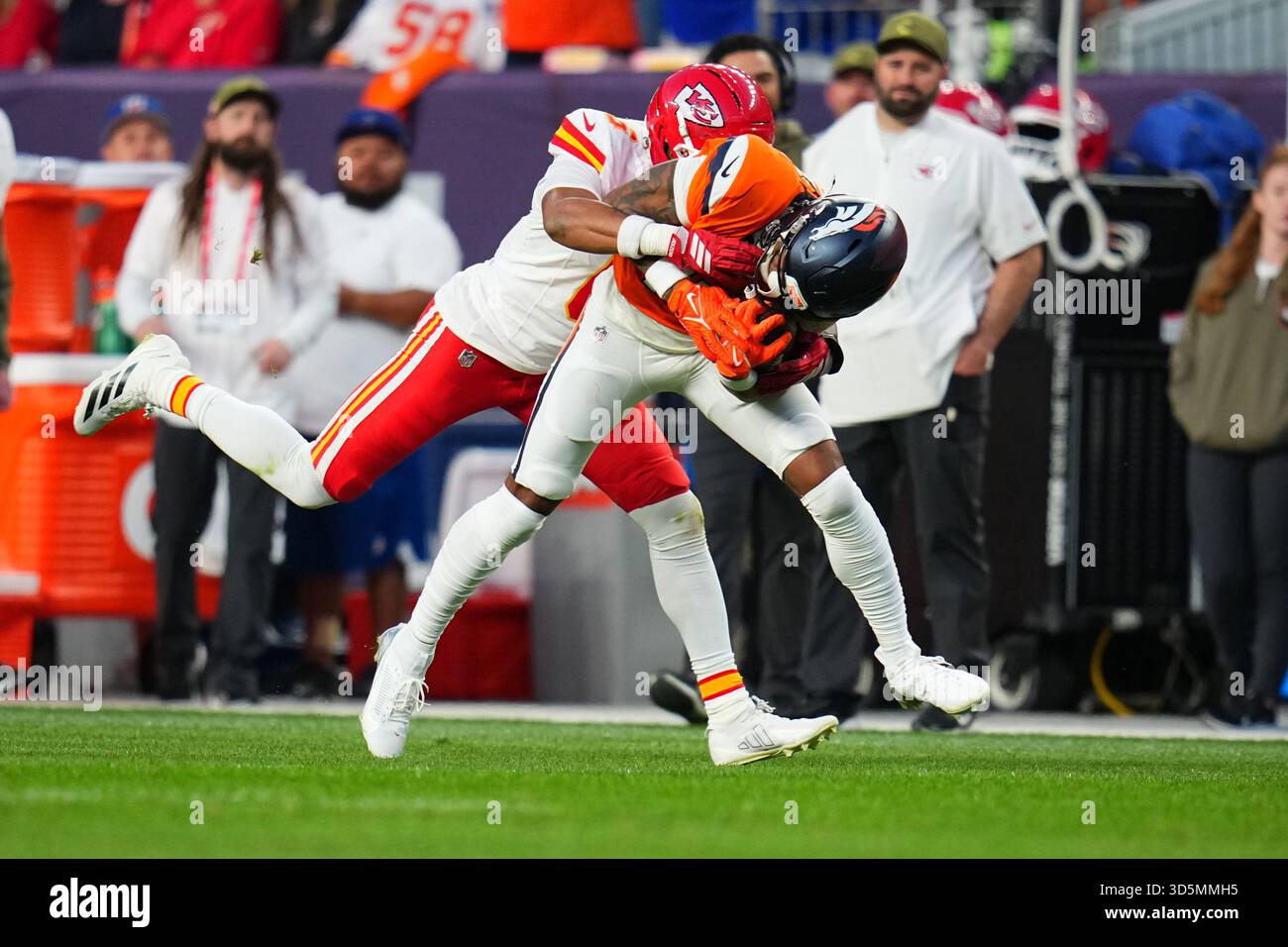 Denver Broncos wide receiver Pat Bryant (13) is tackled by Kansas City ...