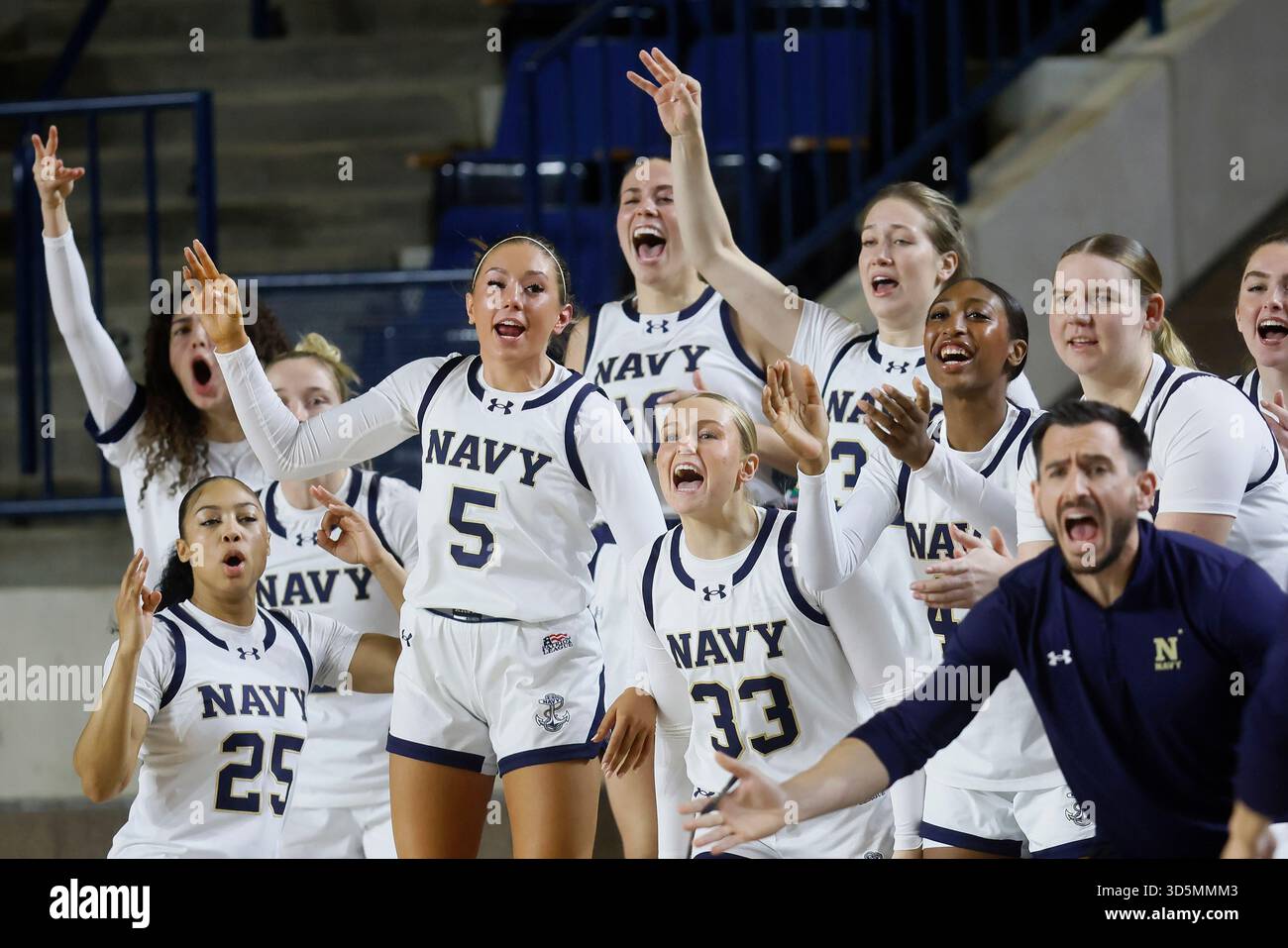 Navy players react to a play during the first half of an NCAA ...