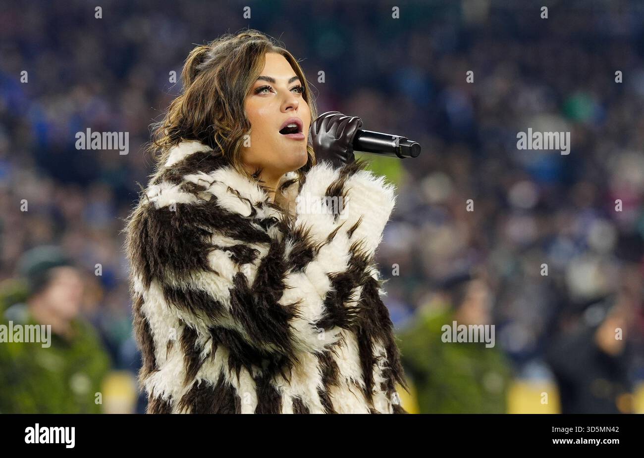 Catie St. Germain sings the Canadian National Anthem prior to the ...