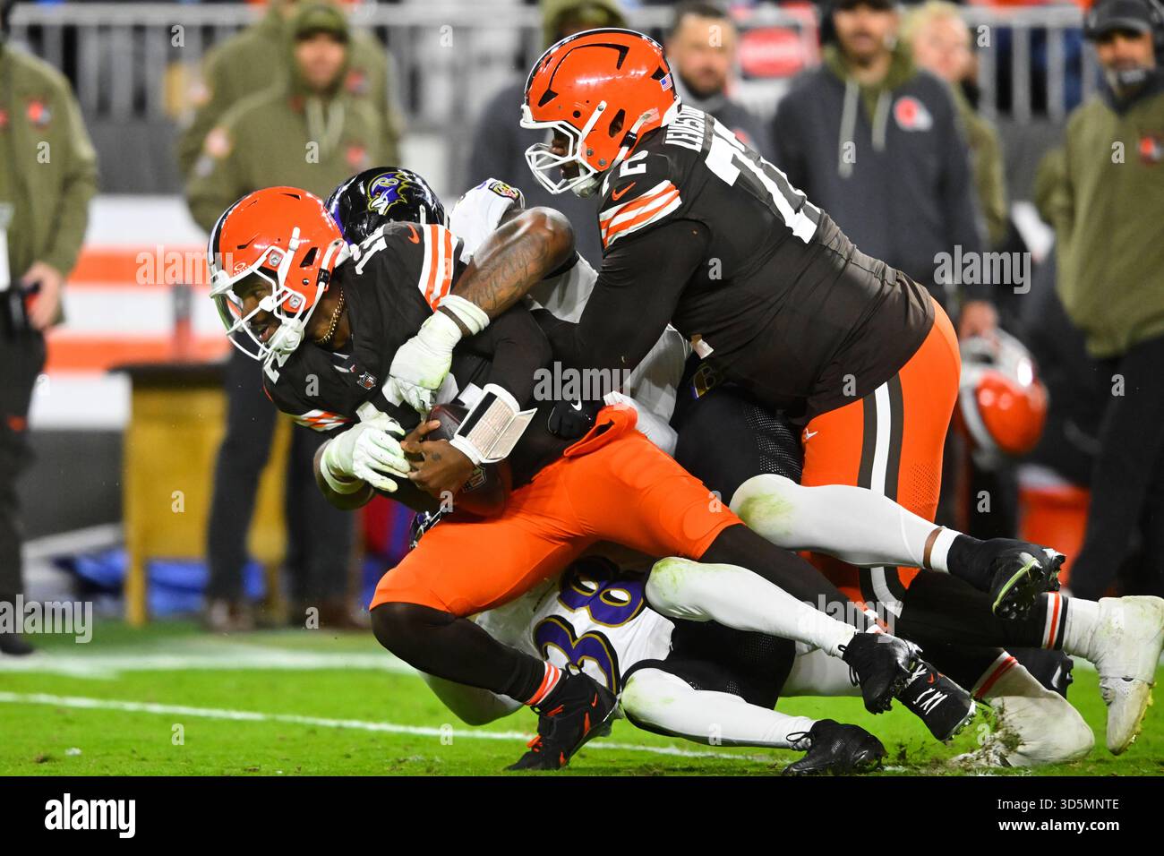 Cleveland Browns quarterback Shedeur Sanders (12) is sacked by ...