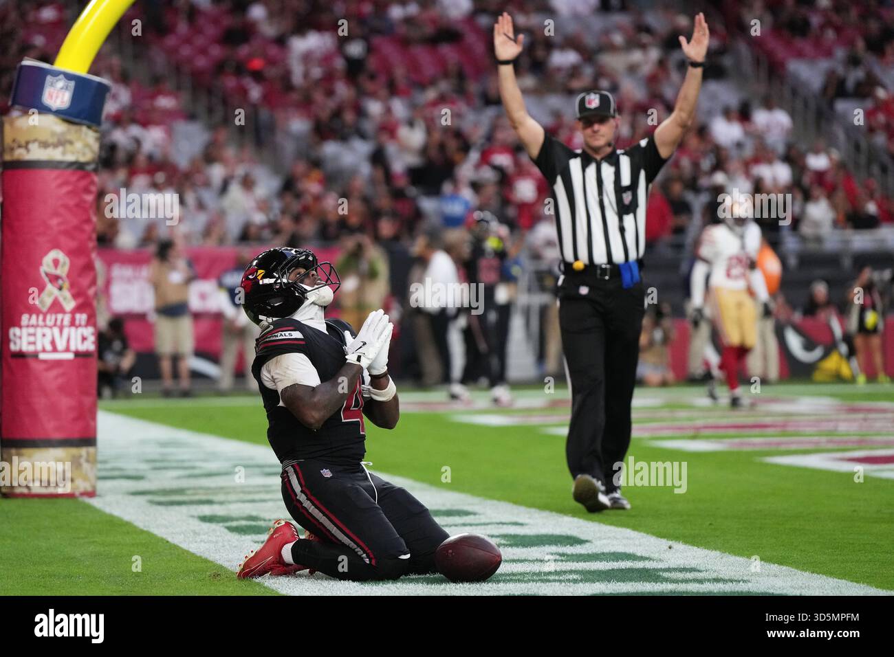 Arizona Cardinals wide receiver Greg Dortch, left, reacts after scoring ...