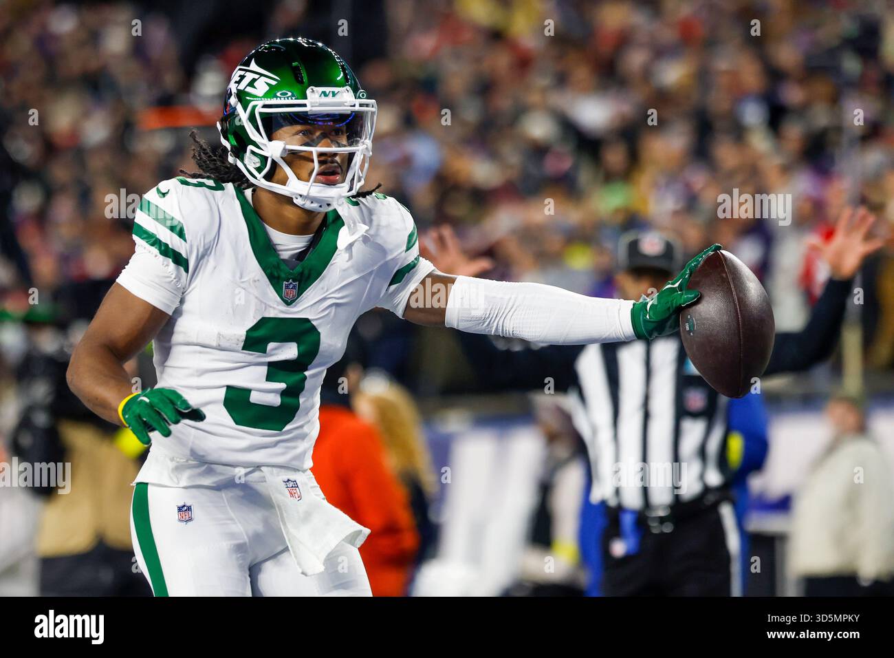 New York Jets wide receiver John Metchie III (3) scores a touchdown ...
