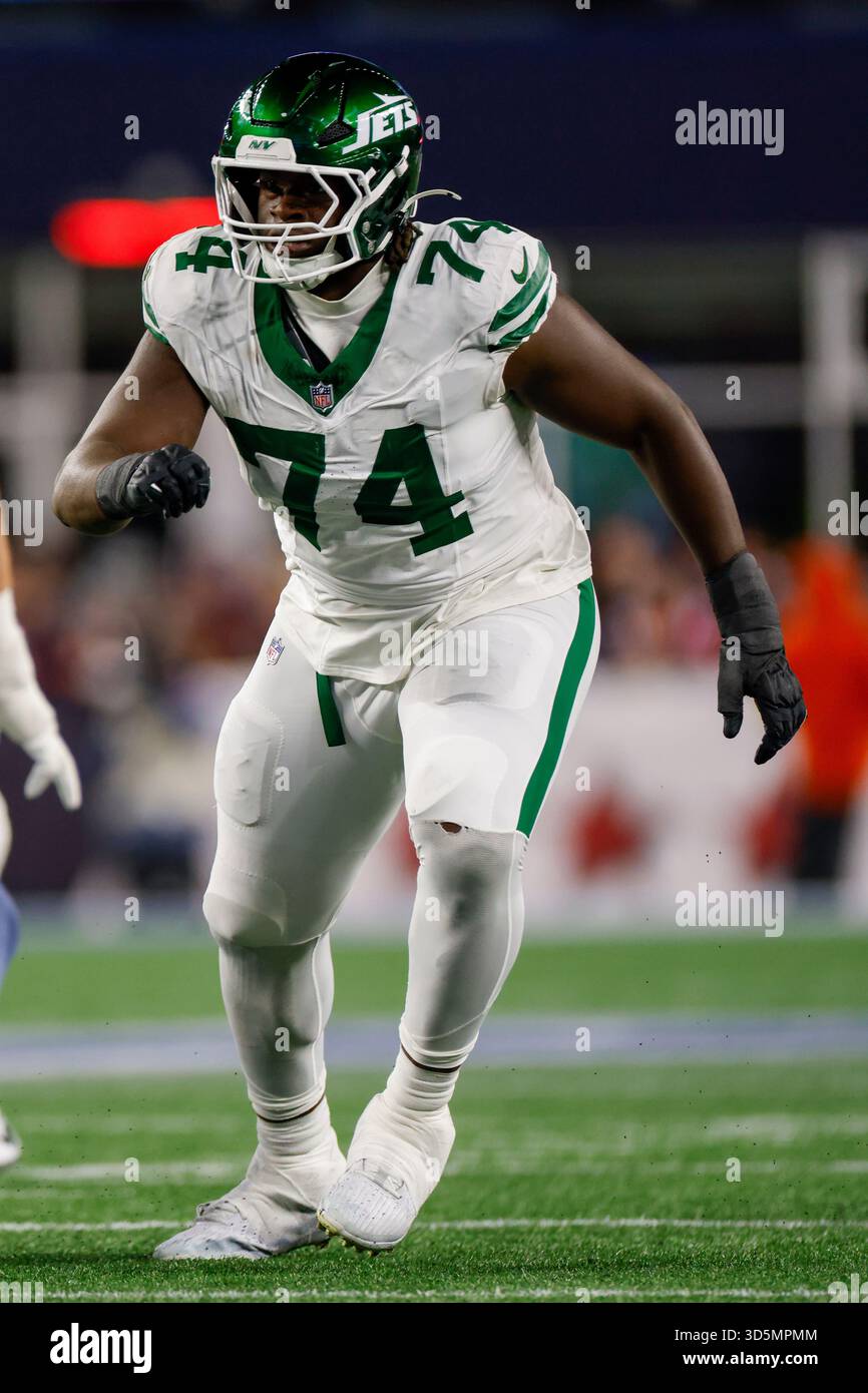 New York Jets offensive tackle Olu Fashanu (74) prepares to block ...