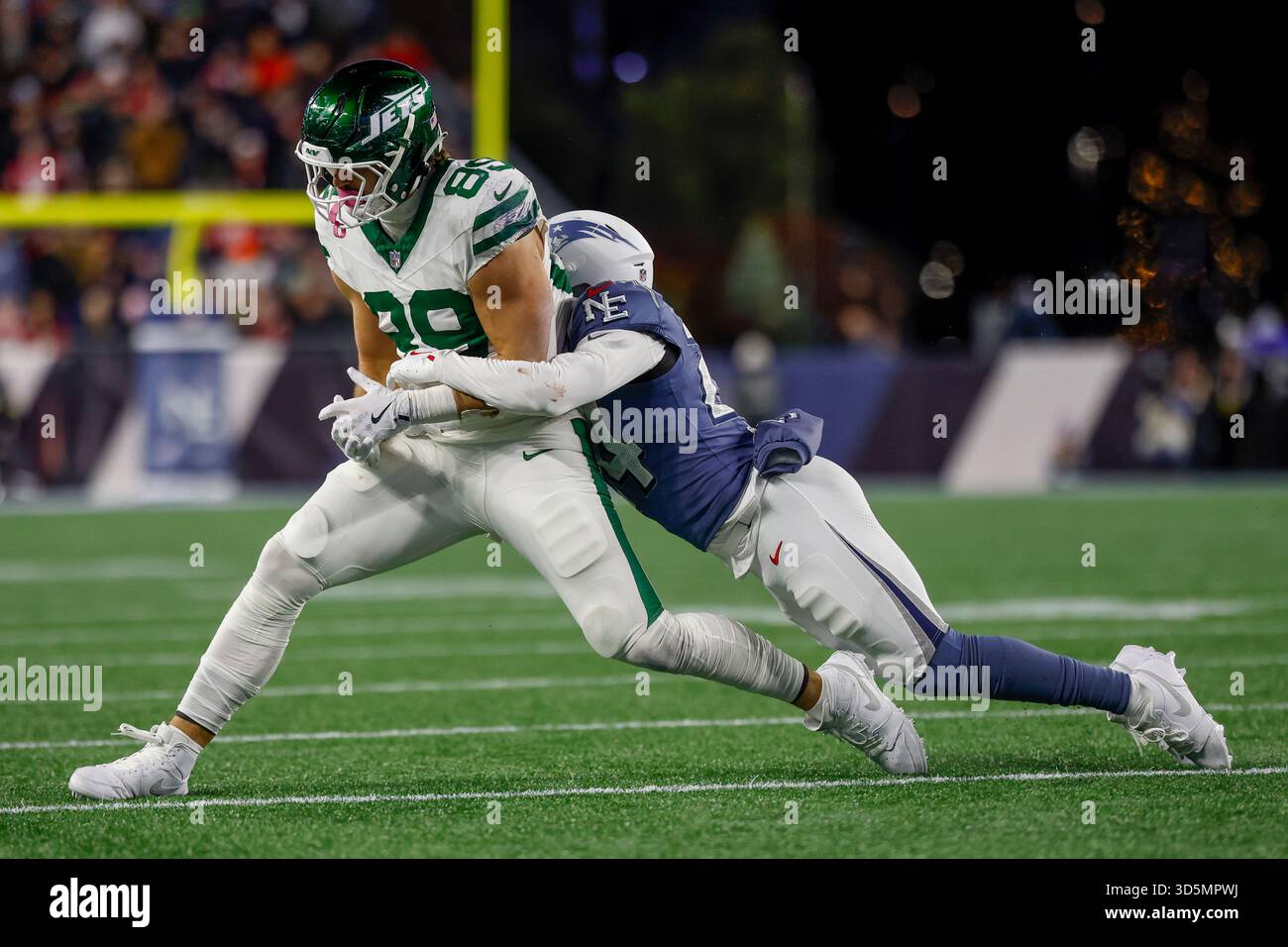 New York Jets tight end Jeremy Ruckert (89) is tackled by New England ...