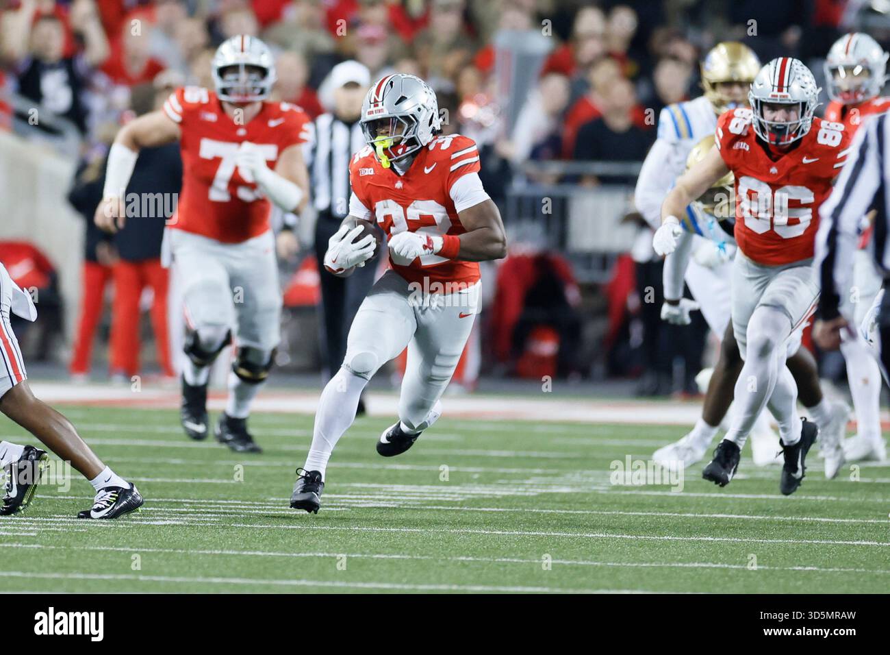 Ohio State running back Isaiah West plays against UCLA during an NCAA ...