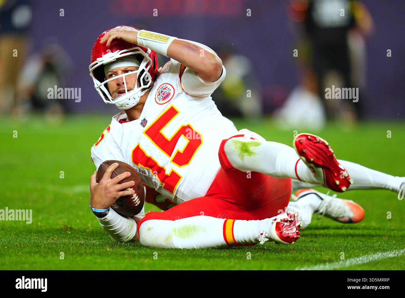 Kansas City Chiefs quarterback Patrick Mahomes (15) reacts after being ...