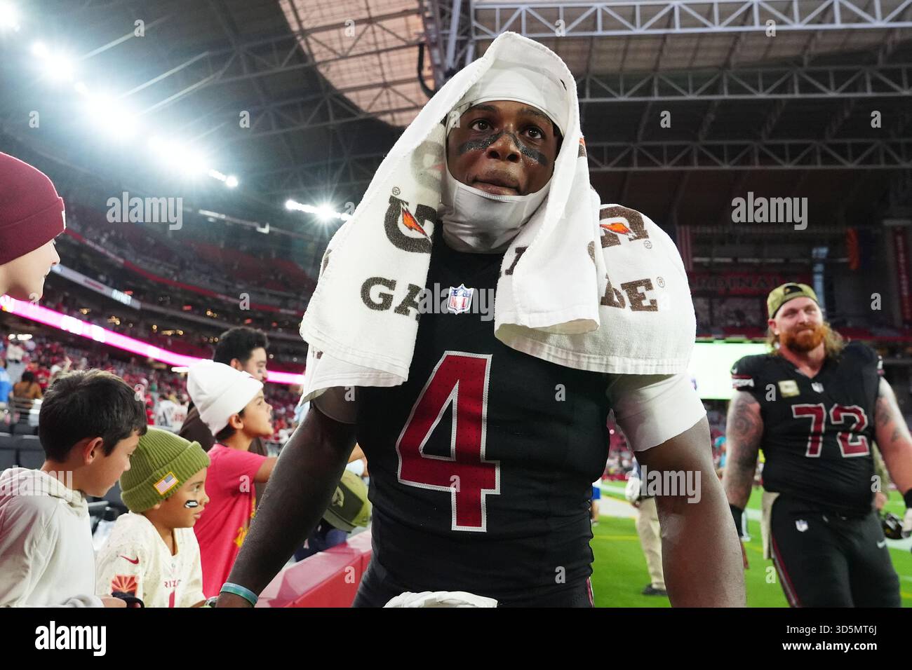 Arizona Cardinals wide receiver Greg Dortch (4) walks off the field ...