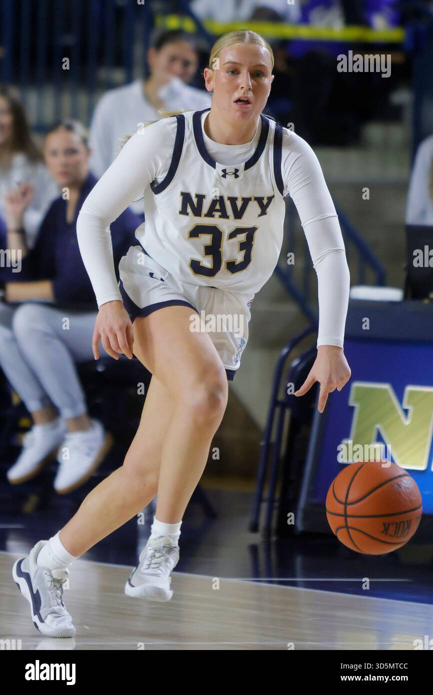 Navy guard Christina Liggio (33) controls the ball during the first ...