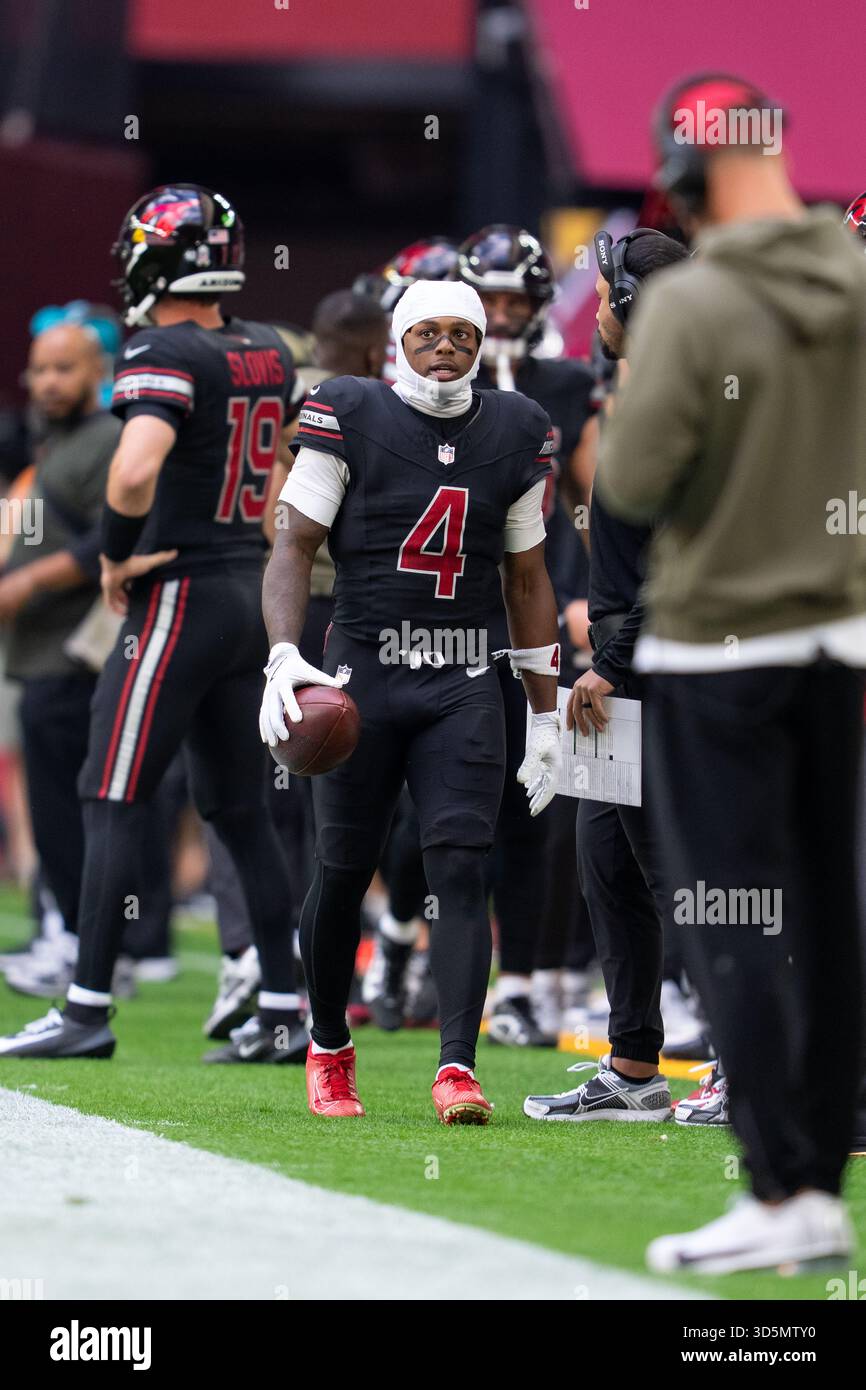 Arizona Cardinals wide receiver Greg Dortch (4) walks down the sideline ...