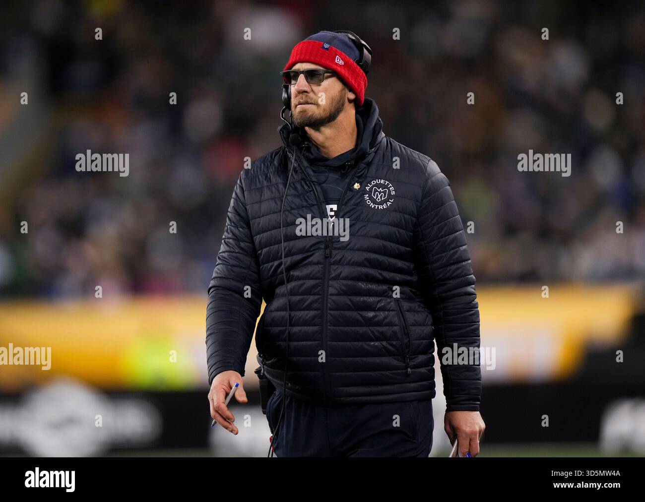 Montreal Alouettes head coach Jason Maas looks on as his team takes on ...