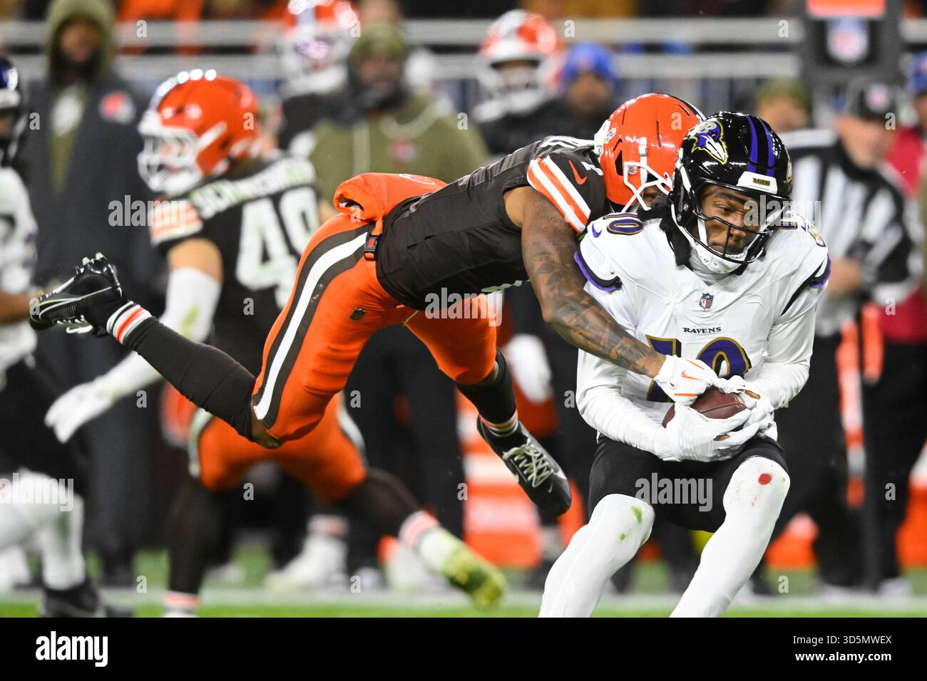 Baltimore Ravens wide receiver DeAndre Hopkins (10) is stopped after ...