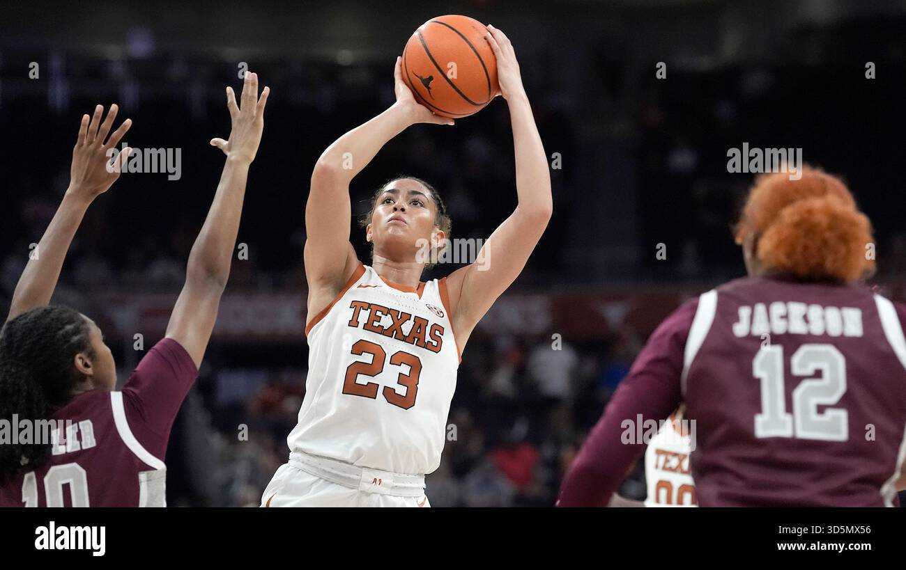 Texas guard Aaliyah Crump gets a shot off over Texas Southern guard ...