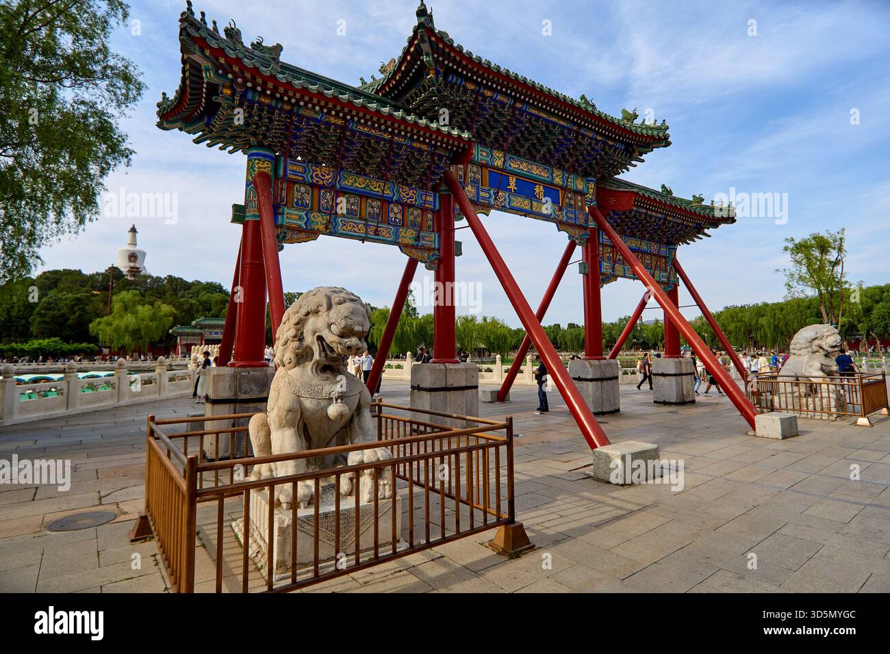 Paifang gate with woodcarvings south of the Tibetan White Dagoba stupa ...