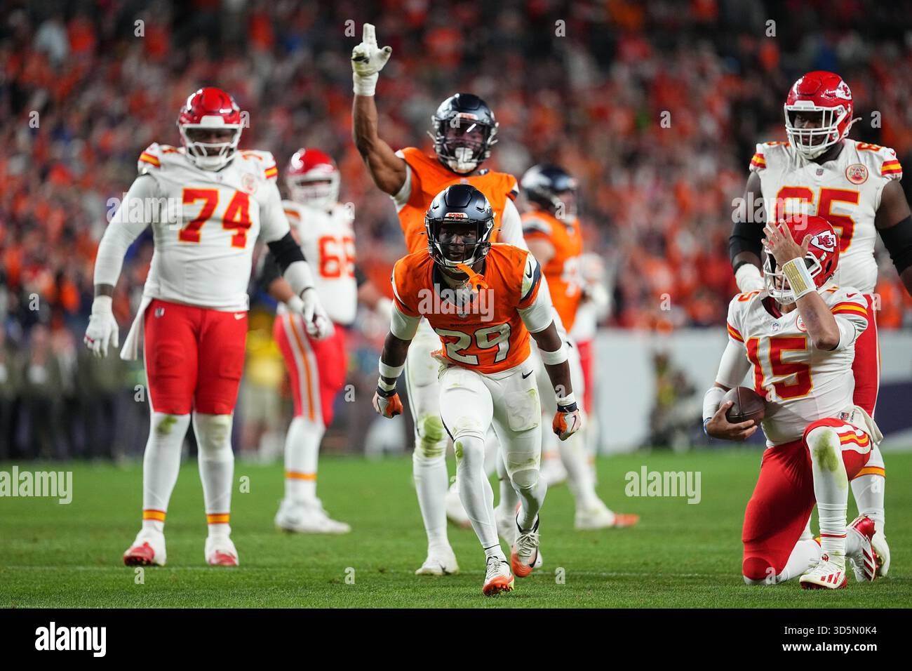 Denver Broncos cornerback Ja'Quan McMillian (29) celebrates a sack ...