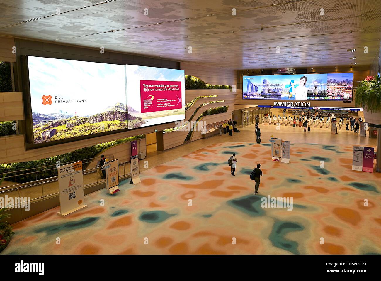 View of the arrival hall at Singapore Changi Airport Terminal 2 with ...