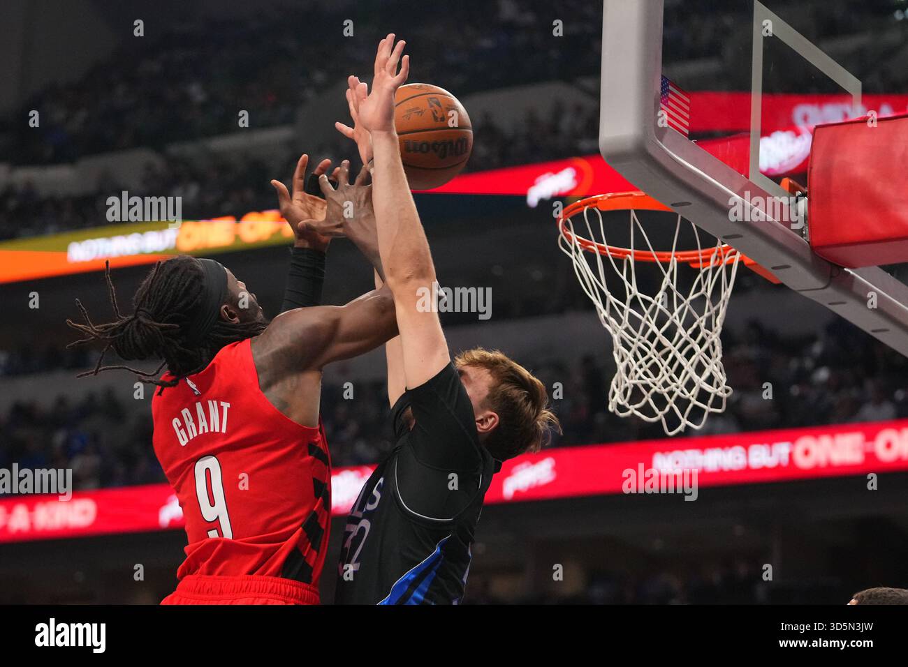 Portland Trail Blazers forward Jerami Grant (9) goes up for a basket ...