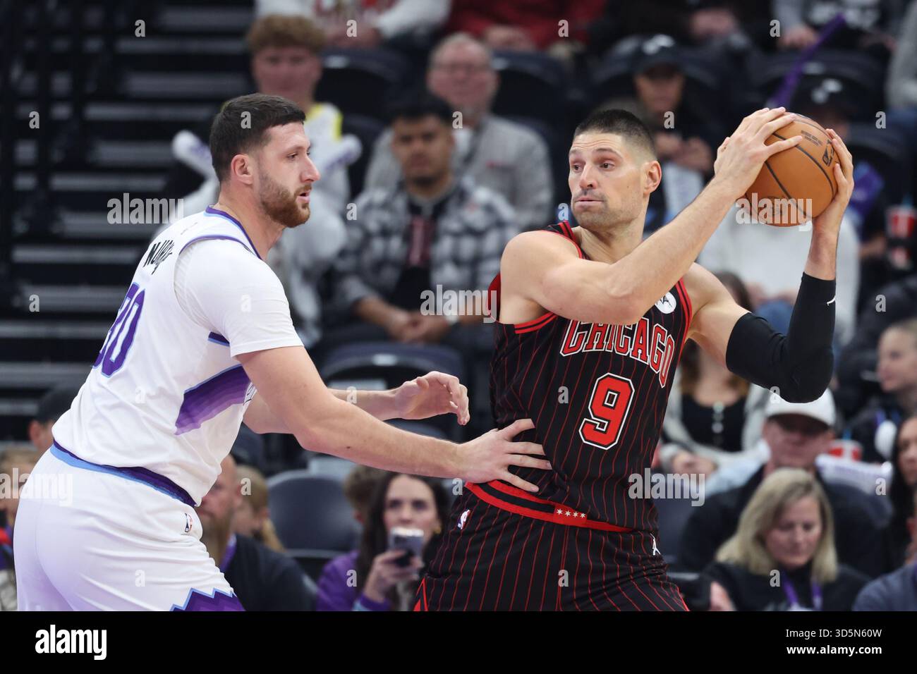 Chicago Bulls center Nikola Vucevic (9) posts up against Utah Jazz ...