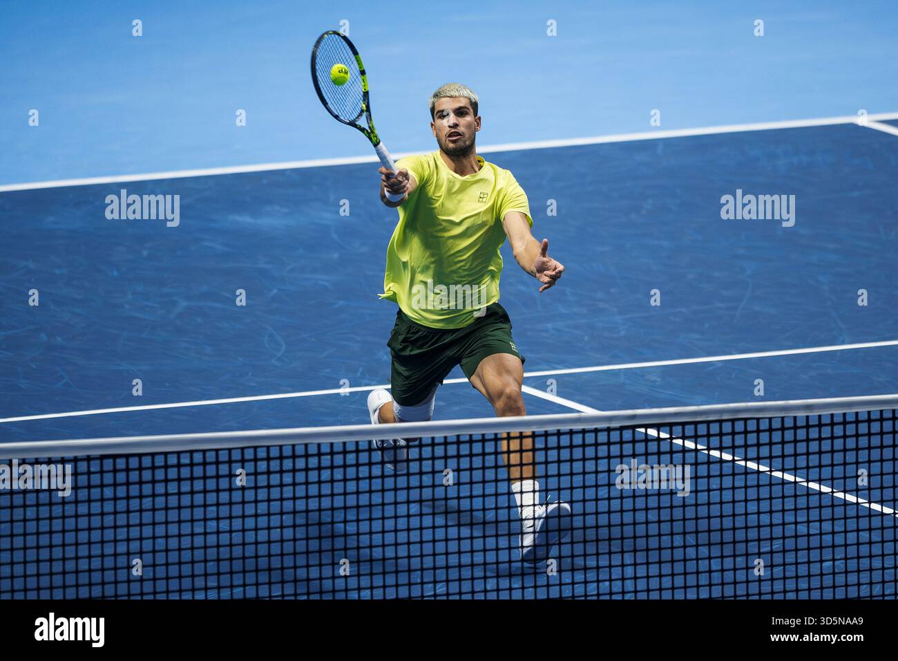 Carlos Alcaraz of Spain plays a forehand during his final singles match ...