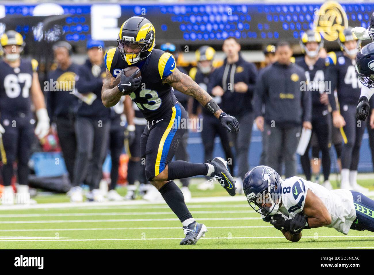 Los Angeles Rams running back Kyren Williams (23) escapes a tackle ...