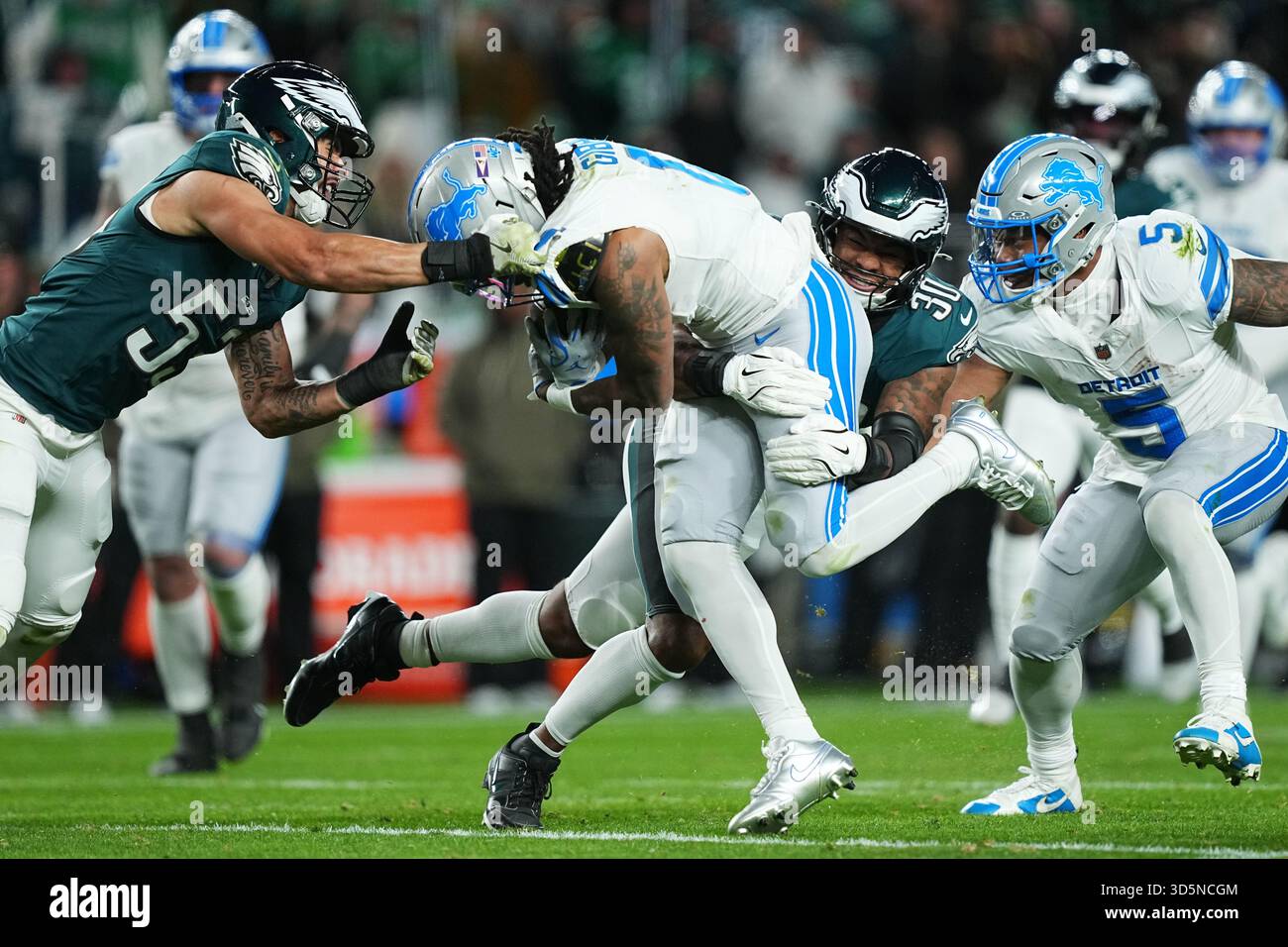 Philadelphia Eagles linebacker Zack Baun (53) and Eagles linebacker Jihaad Campbell (30) bring ...