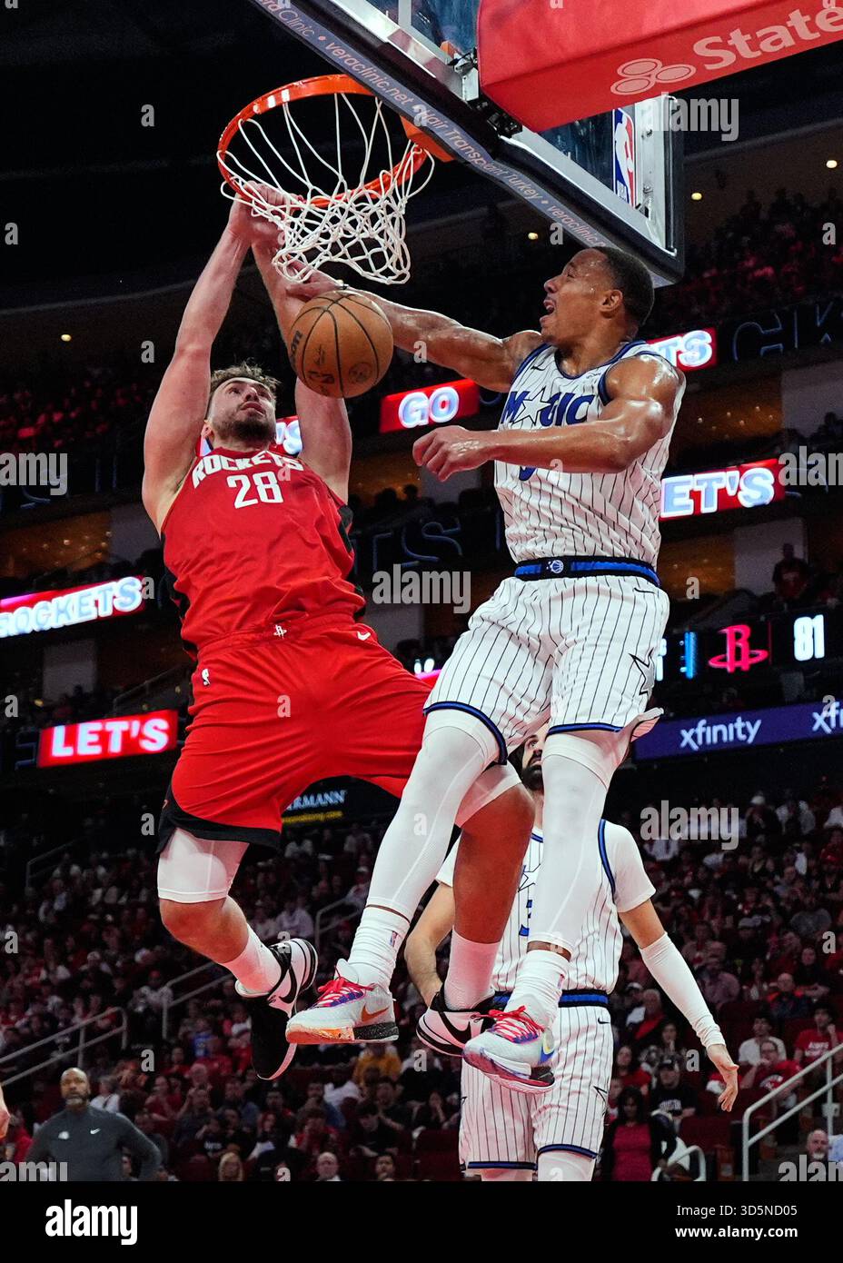 Houston Rockets center Alperen Sengun (28) dunks against Orlando Magic ...